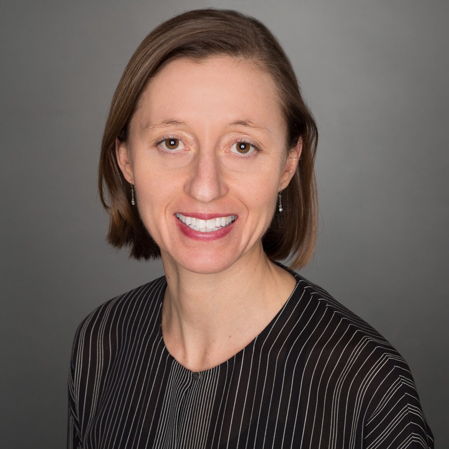 Dr Gwen Busby - Arena International