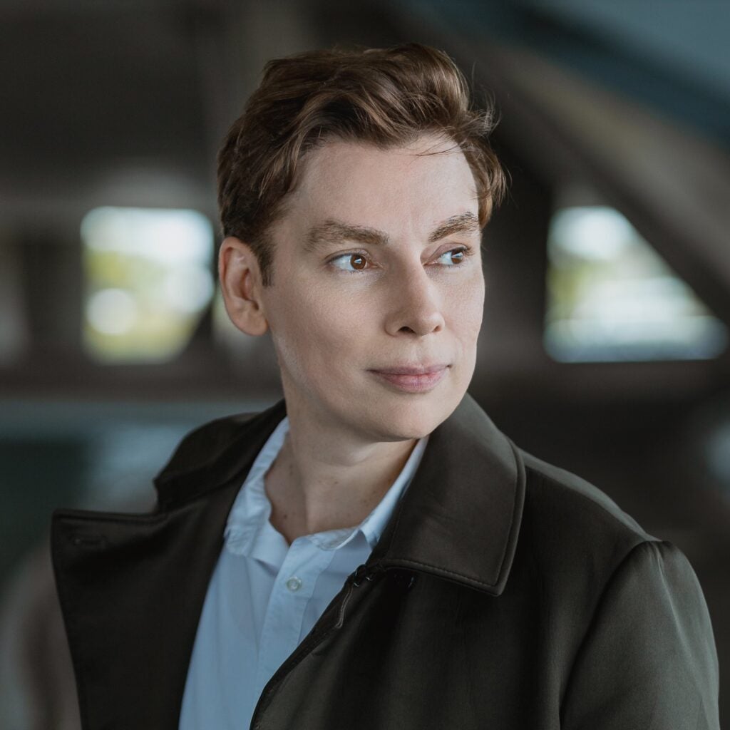 Dr. Dave Lütkenhaus - Arena International